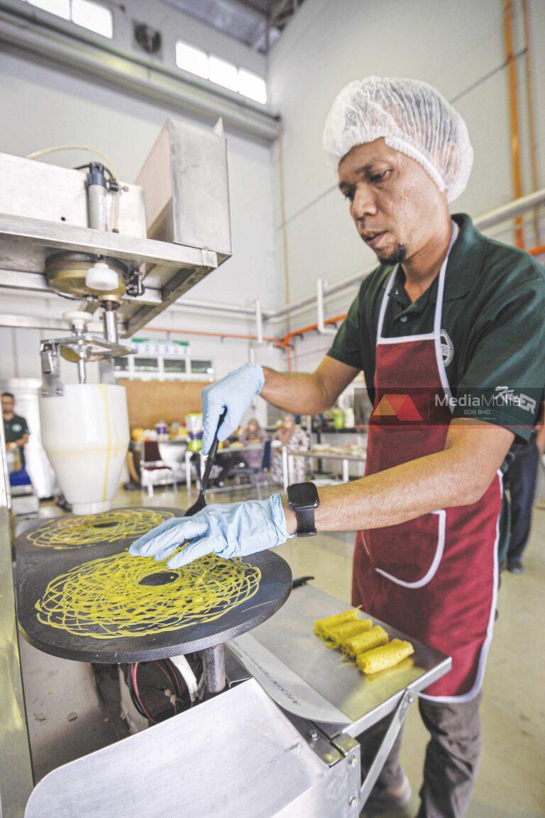 Mesin pembentuk roti jala seragam - Utusan Malaysia